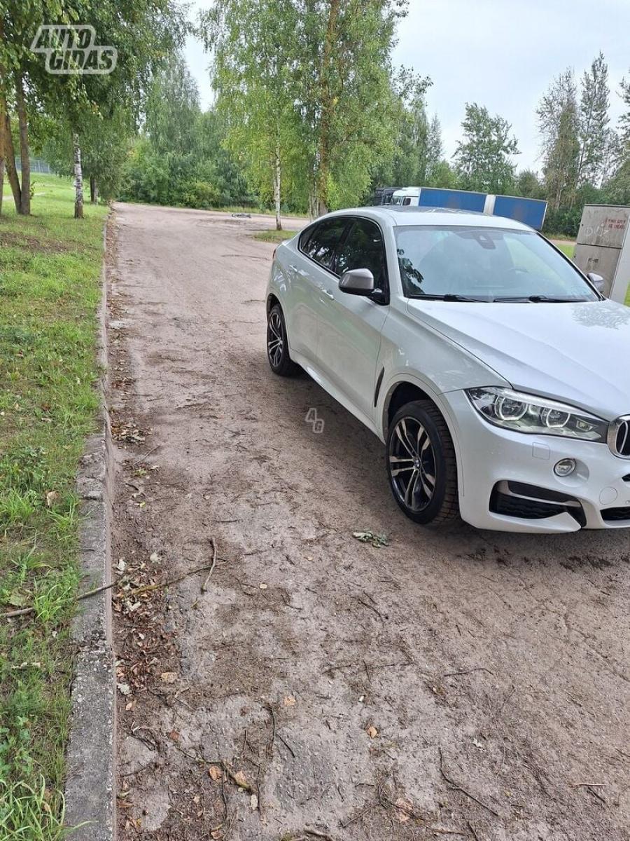 White BMW X6 2015 in Joniskis, with an engine capacity of 3.00 L and mileage of 215 thousand km for 16995 €, photo 5 on AUTOMOTO.COM.LV