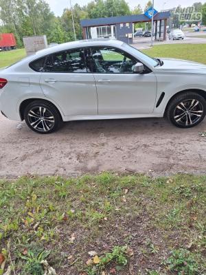 White BMW X6 2015 in Joniskis, with an engine capacity of 3.00 L and mileage of 215 thousand km for 16995 €, photo 6 on AUTOMOTO.COM.LV