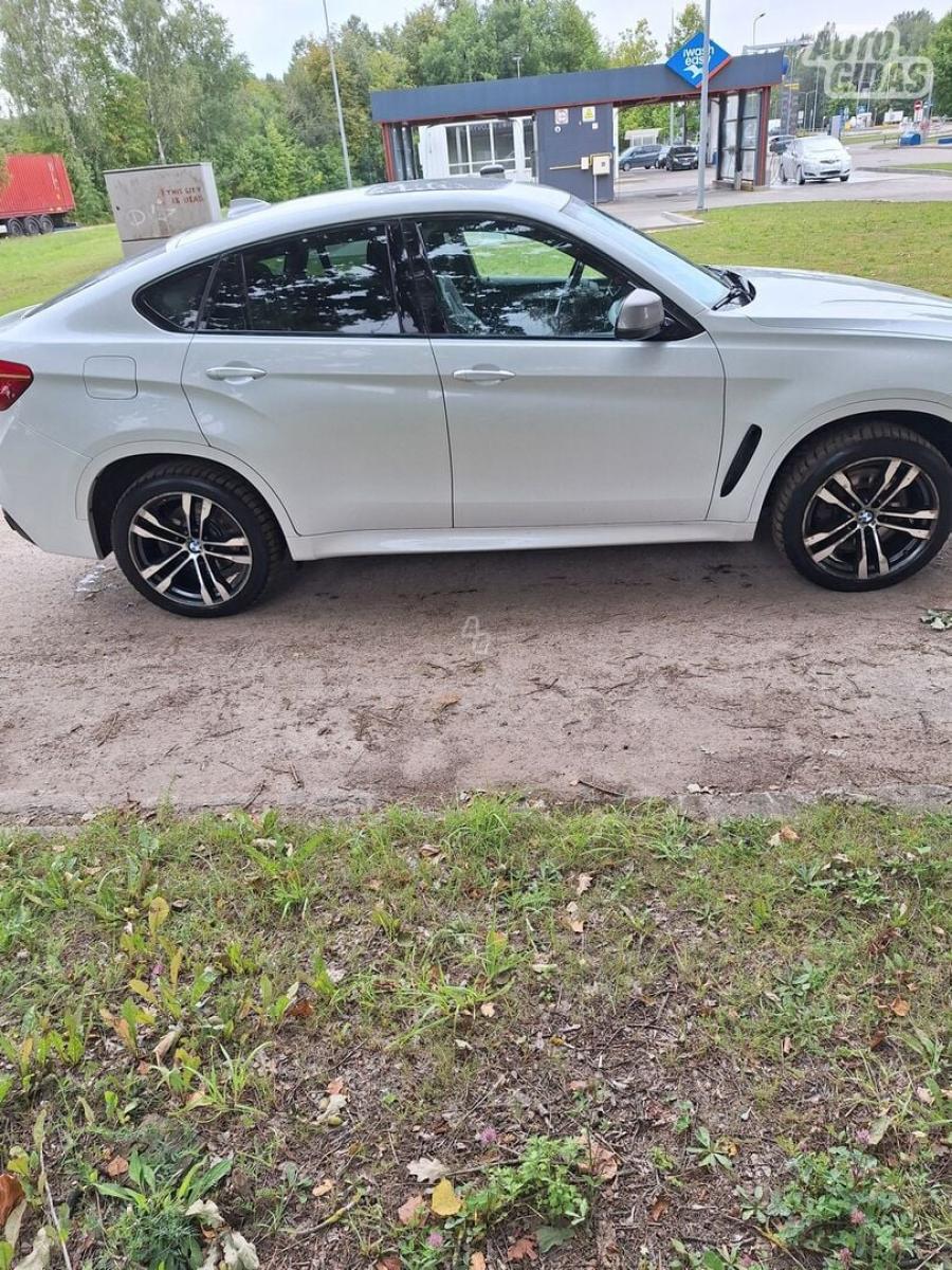 White BMW X6 2015 in Joniskis, with an engine capacity of 3.00 L and mileage of 215 thousand km for 16995 €, photo 6 on AUTOMOTO.COM.LV