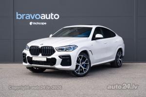 White BMW X6 2022 in Tartu, with an engine capacity of 3.00 L and mileage of 66 thousand km for 69900 €, photo  on AUTOMOTO.COM.LV
