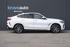White BMW X6 2022 in Tartu, with an engine capacity of 3.00 L and mileage of 66 thousand km for 69900 €, photo 5 on AUTOMOTO.COM.LV