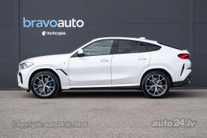 White BMW X6 2022 in Tartu, with an engine capacity of 3.00 L and mileage of 66 thousand km for 69900 €, photo 6 on AUTOMOTO.COM.LV