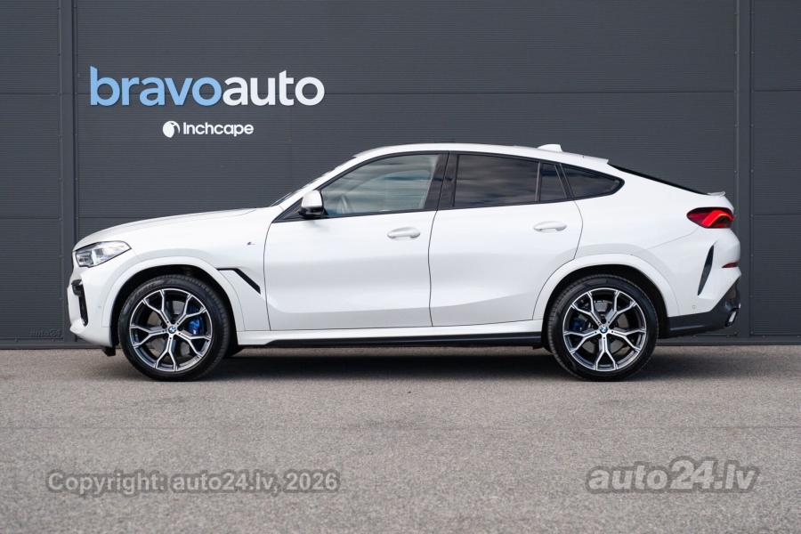 White BMW X6 2022 in Tartu, with an engine capacity of 3.00 L and mileage of 66 thousand km for 69900 €, photo 6 on AUTOMOTO.COM.LV