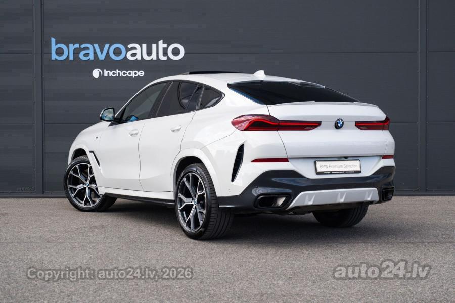 White BMW X6 2022 in Tartu, with an engine capacity of 3.00 L and mileage of 66 thousand km for 69900 €, photo 7 on AUTOMOTO.COM.LV