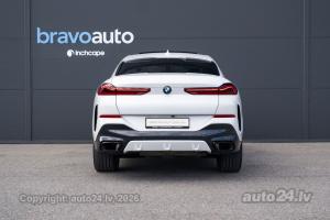 White BMW X6 2022 in Tartu, with an engine capacity of 3.00 L and mileage of 66 thousand km for 69900 €, photo 8 on AUTOMOTO.COM.LV