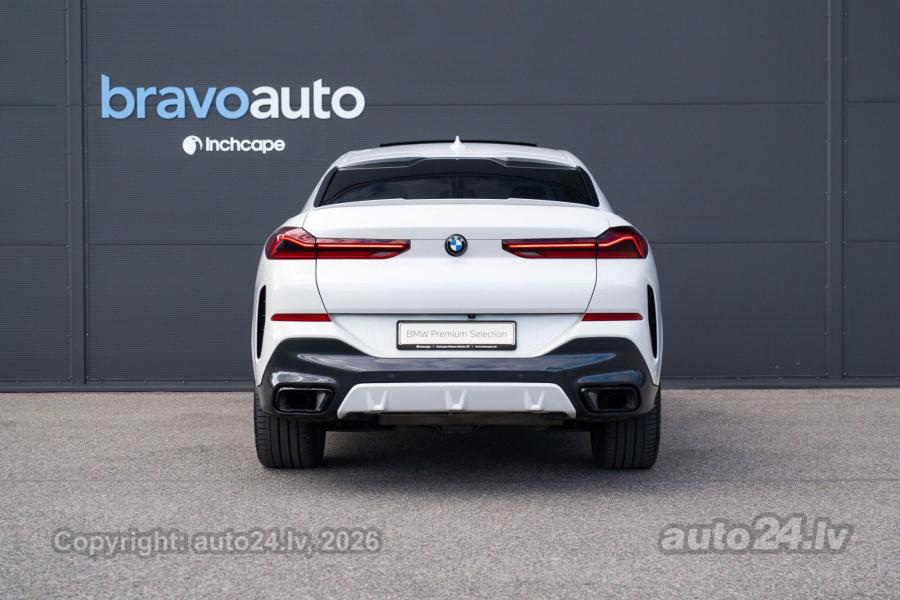 White BMW X6 2022 in Tartu, with an engine capacity of 3.00 L and mileage of 66 thousand km for 69900 €, photo 8 on AUTOMOTO.COM.LV