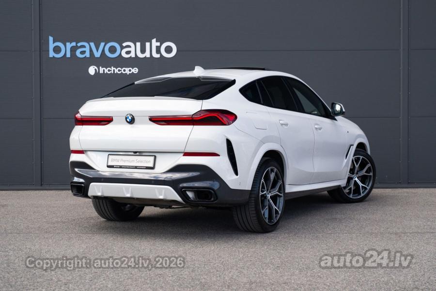 White BMW X6 2022 in Tartu, with an engine capacity of 3.00 L and mileage of 66 thousand km for 69900 €, photo 9 on AUTOMOTO.COM.LV
