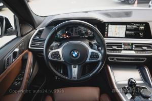 White BMW X6 2022 in Tartu, with an engine capacity of 3.00 L and mileage of 66 thousand km for 69900 €, photo 11 on AUTOMOTO.COM.LV