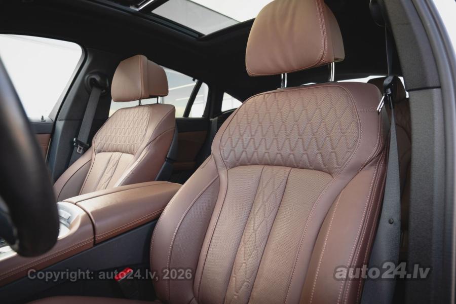 White BMW X6 2022 in Tartu, with an engine capacity of 3.00 L and mileage of 66 thousand km for 69900 €, photo 12 on AUTOMOTO.COM.LV