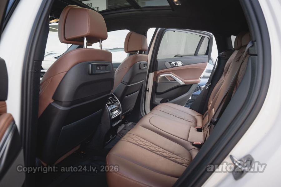 White BMW X6 2022 in Tartu, with an engine capacity of 3.00 L and mileage of 66 thousand km for 69900 €, photo 14 on AUTOMOTO.COM.LV