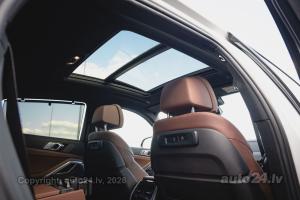 White BMW X6 2022 in Tartu, with an engine capacity of 3.00 L and mileage of 66 thousand km for 69900 €, photo 16 on AUTOMOTO.COM.LV