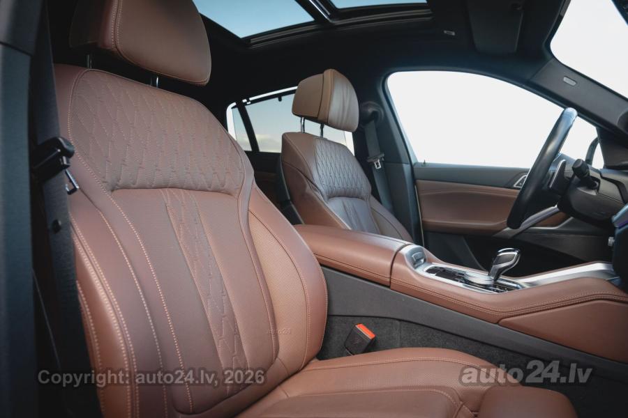 White BMW X6 2022 in Tartu, with an engine capacity of 3.00 L and mileage of 66 thousand km for 69900 €, photo 17 on AUTOMOTO.COM.LV