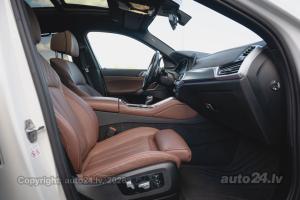 White BMW X6 2022 in Tartu, with an engine capacity of 3.00 L and mileage of 66 thousand km for 69900 €, photo 18 on AUTOMOTO.COM.LV
