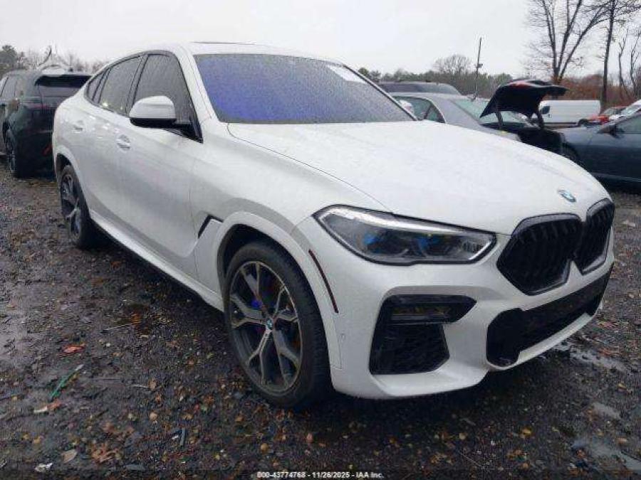 Yellow BMW X6 2021 in Klaipeda, with an engine capacity of 3.00 L and mileage of 74 thousand km for 32200 €, photo 1 on AUTOMOTO.COM.LV