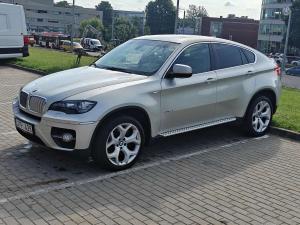 Yellow BMW X6 2008 in Vilnius, with an engine capacity of 4.40 L and mileage of 198 thousand km for 9450 €, photo  on AUTOMOTO.COM.LV
