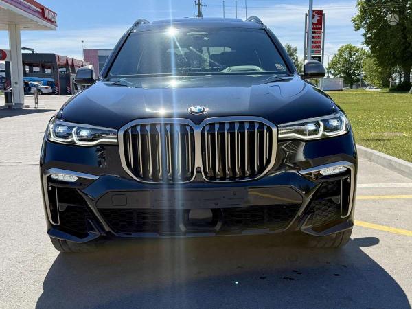 Black BMW X7 2019 in Taurage, with an engine capacity of 2.99 L and mileage of 190 thousand km for 42900 €, photo 4 on AUTOMOTO.COM.LV
