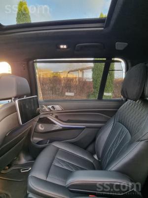 Black BMW X7 2020 in Riga, with an engine capacity of 3.00 L and mileage of 79 thousand km for 64400 €, photo 11 on AUTOMOTO.COM.LV