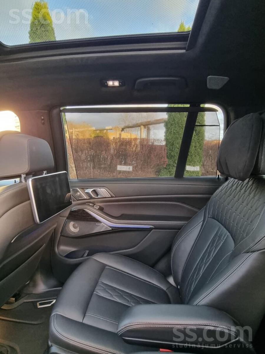 Black BMW X7 2020 in Riga, with an engine capacity of 3.00 L and mileage of 79 thousand km for 64400 €, photo 11 on AUTOMOTO.COM.LV