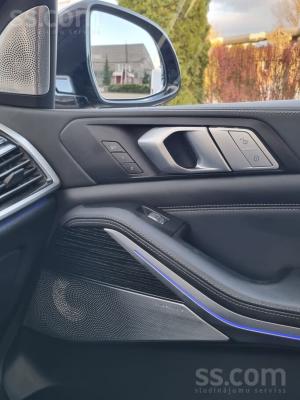 Black BMW X7 2020 in Riga, with an engine capacity of 3.00 L and mileage of 79 thousand km for 64400 €, photo 14 on AUTOMOTO.COM.LV