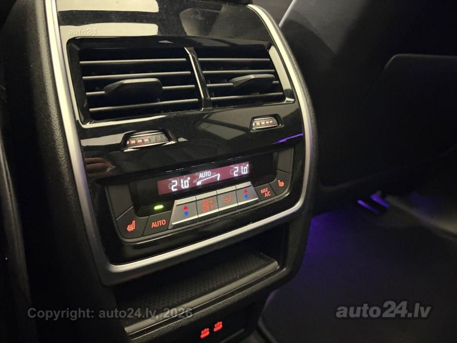 Black BMW X7 2020 in Tallinn, with an engine capacity of 3.00 L and mileage of 136 thousand km for 59900 €, photo 14 on AUTOMOTO.COM.LV