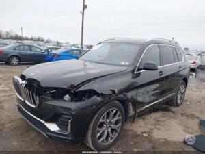 Black BMW X7 2021 in Klaipeda, with an engine capacity of 3.00 L and mileage of 75 thousand km for 19000 €, photo 6 on AUTOMOTO.COM.LV