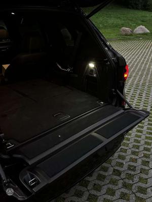 Black BMW X7 2022 in Vilnius, with an engine capacity of 3.00 L and mileage of 58 thousand km for 61000 €, photo 23 on AUTOMOTO.COM.LV