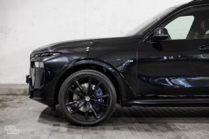 Black BMW X7 2023 in Vilnius, with an engine capacity of 3.00 L and mileage of 77 thousand km for 86771 €, photo 7 on AUTOMOTO.COM.LV