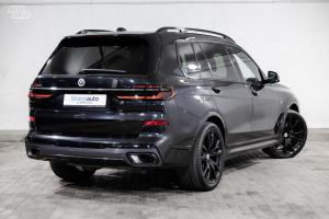Black BMW X7 2023 in Vilnius, with an engine capacity of 3.00 L and mileage of 77 thousand km for 86771 €, photo 10 on AUTOMOTO.COM.LV