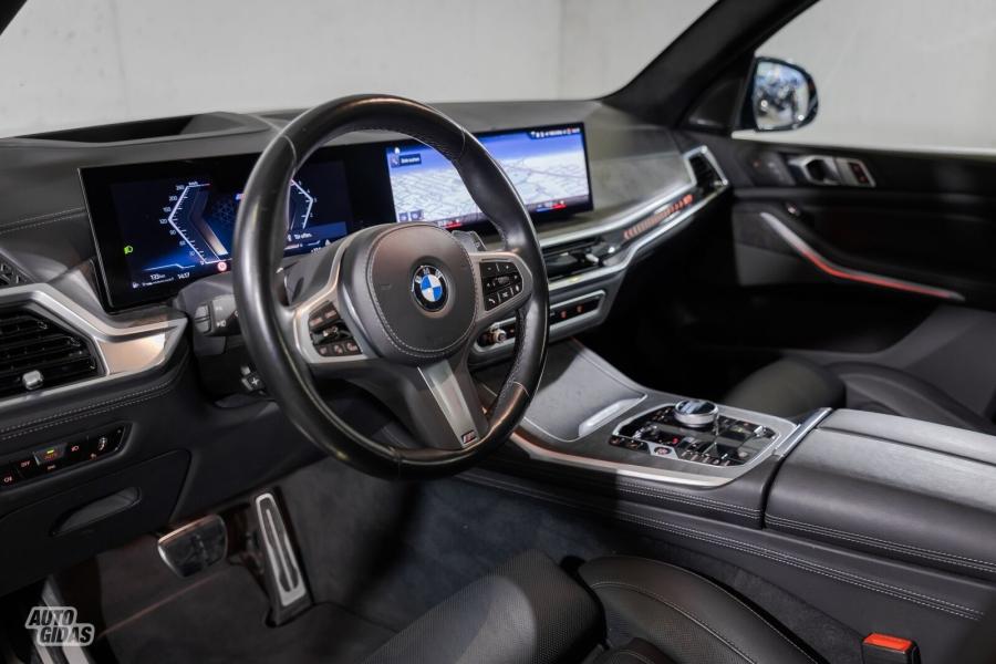 Black BMW X7 2023 in Vilnius, with an engine capacity of 3.00 L and mileage of 77 thousand km for 86771 €, photo 12 on AUTOMOTO.COM.LV