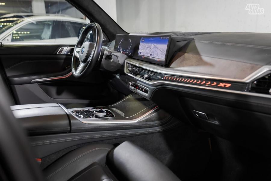 Black BMW X7 2023 in Vilnius, with an engine capacity of 3.00 L and mileage of 77 thousand km for 86771 €, photo 14 on AUTOMOTO.COM.LV