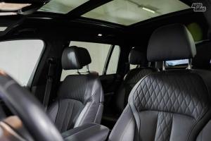 Black BMW X7 2023 in Vilnius, with an engine capacity of 3.00 L and mileage of 77 thousand km for 86771 €, photo 30 on AUTOMOTO.COM.LV
