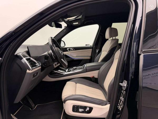 Black BMW X7 2023 in Panevezys, with an engine capacity of 2.99 L and mileage of 149 thousand km for 82990 €, photo 9 on AUTOMOTO.COM.LV