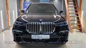 Black BMW X7 2019 in Tallinn, with an engine capacity of 3.00 L and mileage of 65 thousand km for 72995 €, photo  on AUTOMOTO.COM.LV