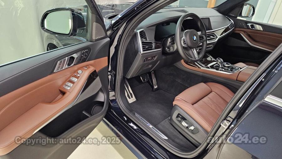 Black BMW X7 2019 in Tallinn, with an engine capacity of 3.00 L and mileage of 65 thousand km for 72995 €, photo 6 on AUTOMOTO.COM.LV