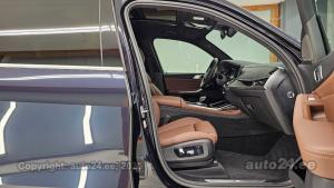 Black BMW X7 2019 in Tallinn, with an engine capacity of 3.00 L and mileage of 65 thousand km for 72995 €, photo 10 on AUTOMOTO.COM.LV