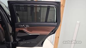 Black BMW X7 2019 in Tallinn, with an engine capacity of 3.00 L and mileage of 65 thousand km for 72995 €, photo 26 on AUTOMOTO.COM.LV