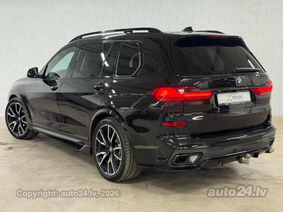 Black BMW X7 2019 in Parnu, with an engine capacity of 3.00 L and mileage of 183 thousand km for 49490 €, photo 5 on AUTOMOTO.COM.LV