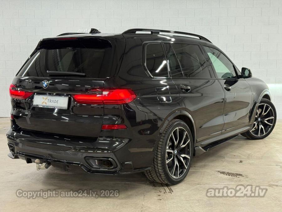 Black BMW X7 2019 in Parnu, with an engine capacity of 3.00 L and mileage of 183 thousand km for 49490 €, photo 6 on AUTOMOTO.COM.LV