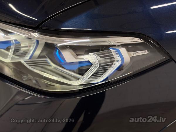 Black BMW X7 2019 in Parnu, with an engine capacity of 3.00 L and mileage of 186 thousand km for 44490 €, photo 8 on AUTOMOTO.COM.LV