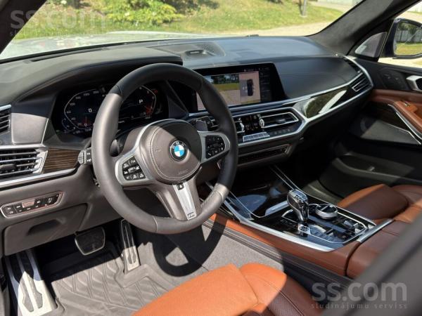 Grey BMW X7 2019 in Riga, with an engine capacity of 3.00 L and mileage of 168 thousand km for 51900 €, photo 7 on AUTOMOTO.COM.LV