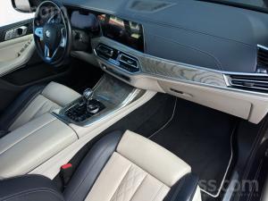 Grey BMW X7 2019 in Riga, with an engine capacity of 3.00 L and mileage of 111 thousand km for 52900 €, photo 6 on AUTOMOTO.COM.LV