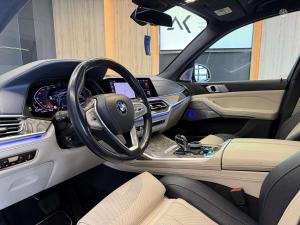 Grey BMW X7 2019 in Kaunas, with an engine capacity of 2.99 L and mileage of 232 thousand km for 46990 €, photo 14 on AUTOMOTO.COM.LV