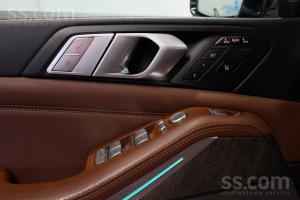 Red BMW X7 2019 in Riga, with an engine capacity of 3.00 L and mileage of 115 thousand km for 47500 €, photo 12 on AUTOMOTO.COM.LV