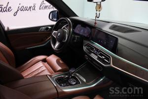 Red BMW X7 2019 in Riga, with an engine capacity of 3.00 L and mileage of 115 thousand km for 47500 €, photo 28 on AUTOMOTO.COM.LV