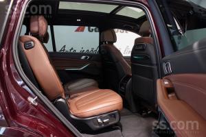 Red BMW X7 2019 in Riga, with an engine capacity of 3.00 L and mileage of 115 thousand km for 47500 €, photo 31 on AUTOMOTO.COM.LV