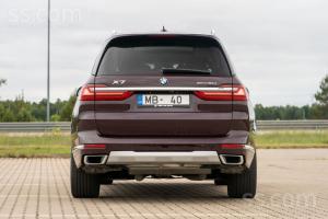 Red BMW X7 2021 in Riga, with an engine capacity of 3.00 L and mileage of 104 thousand km for 61800 €, photo 6 on AUTOMOTO.COM.LV