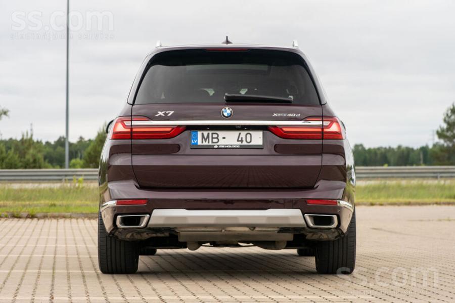 Red BMW X7 2021 in Riga, with an engine capacity of 3.00 L and mileage of 104 thousand km for 61800 €, photo 6 on AUTOMOTO.COM.LV