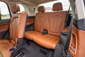Red BMW X7 2021 in Riga, with an engine capacity of 3.00 L and mileage of 104 thousand km for 61800 €, photo 9 on AUTOMOTO.COM.LV