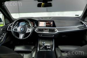 White BMW X7 2019 in Riga, with an engine capacity of 3.00 L and mileage of 89 thousand km for 50990 €, photo 19 on AUTOMOTO.COM.LV