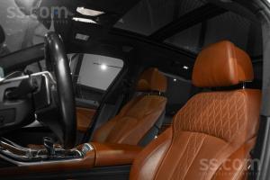 White BMW X7 2019 in Riga, with an engine capacity of 3.00 L and mileage of 56 thousand km for 63900 €, photo 36 on AUTOMOTO.COM.LV